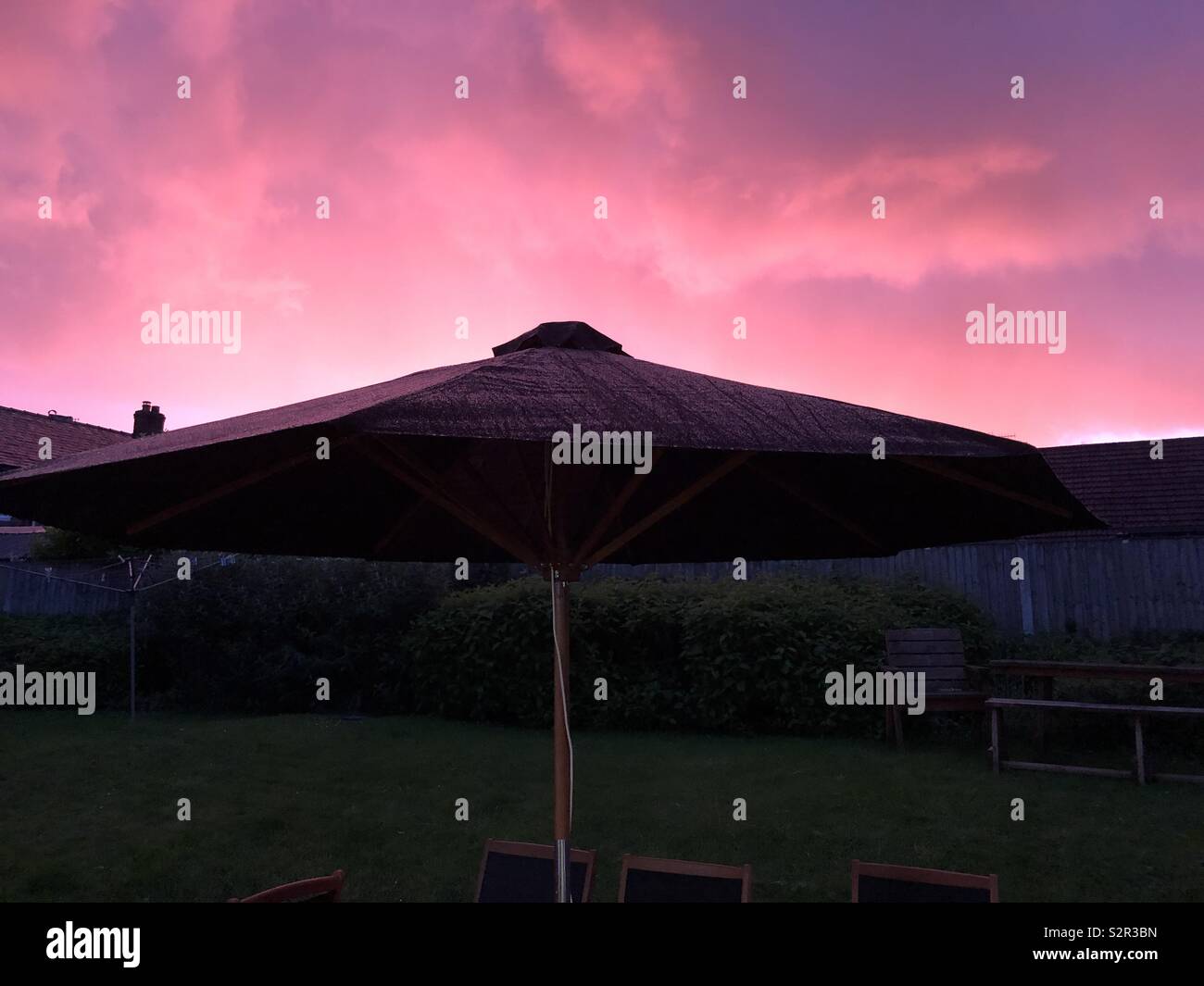 Pink sky at night Stock Photo - Alamy