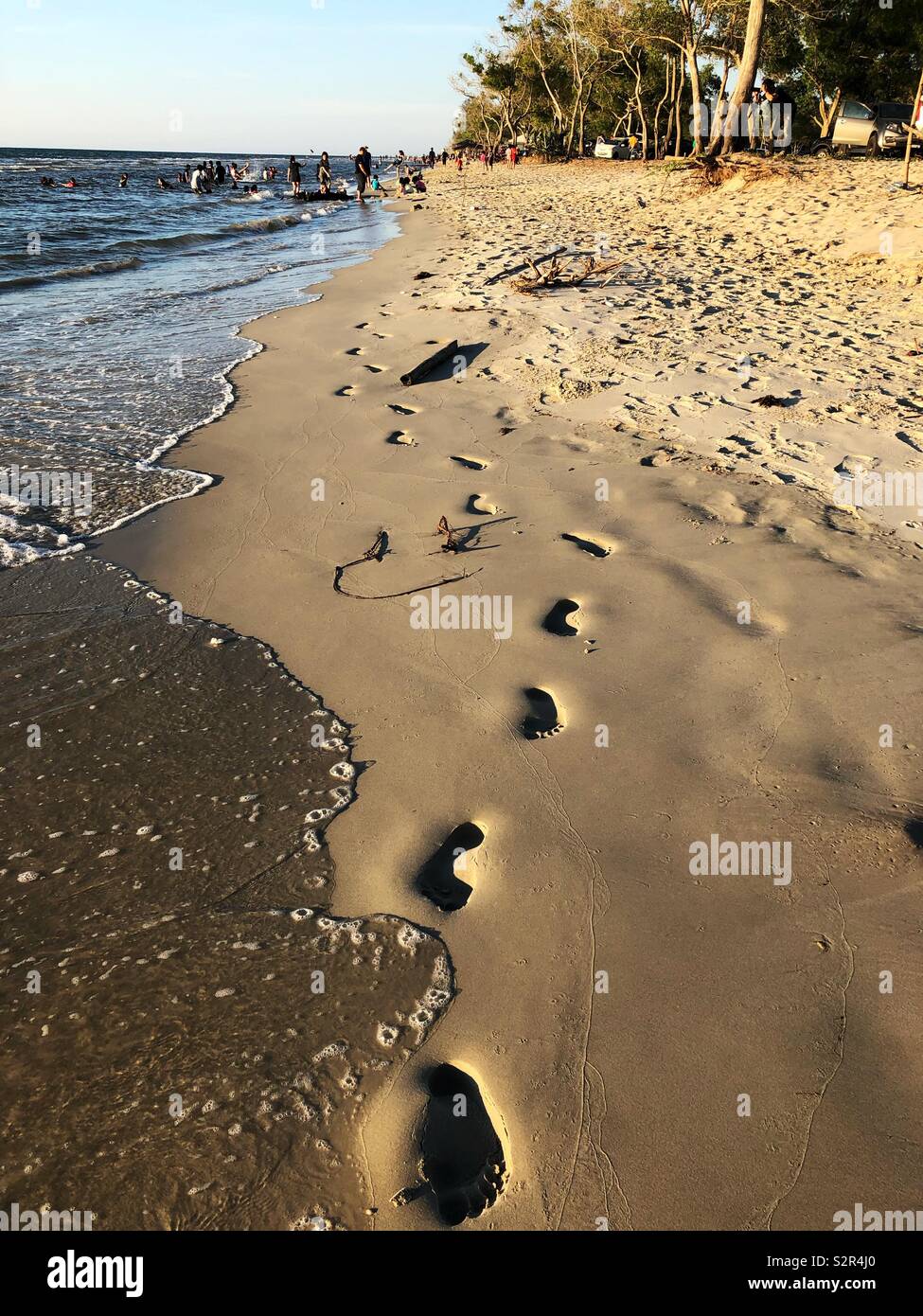 Foot prints in the sand, bare foot at sabandar beach on a beautiful ...