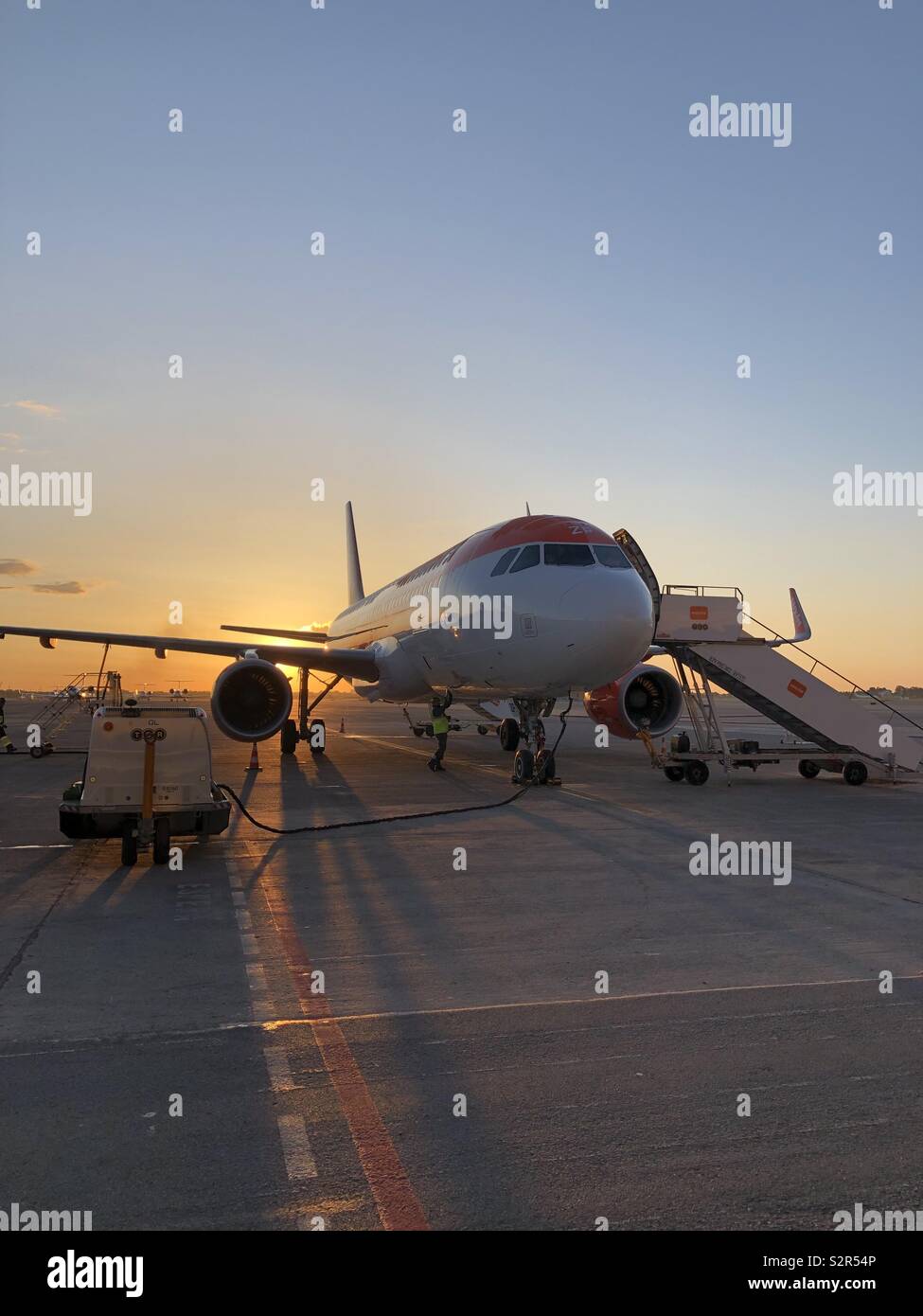 Plane on runway Stock Photo - Alamy