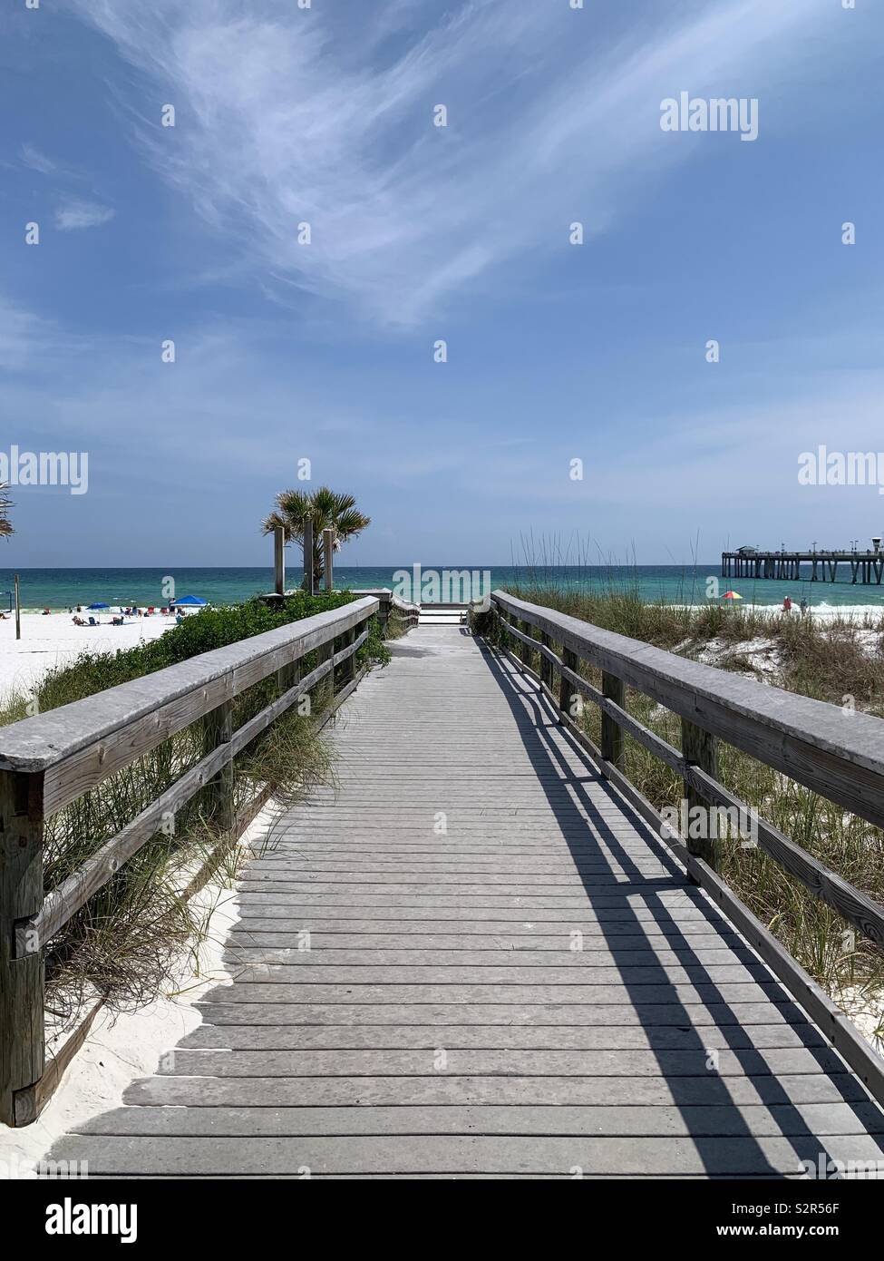 Scenic walkway to beach with beautiful water and skies Stock Photo - Alamy