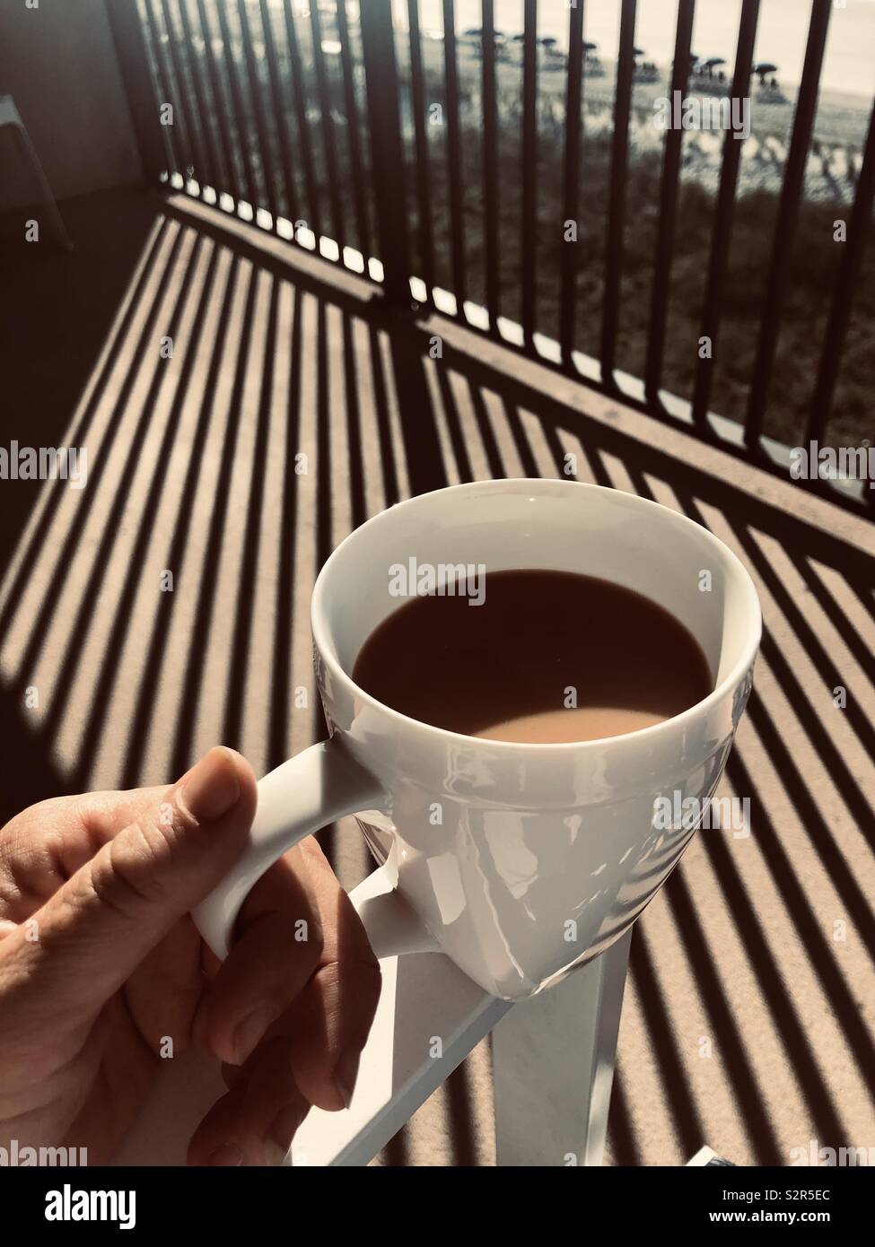 Beach, morning coffee Stock Photo - Alamy