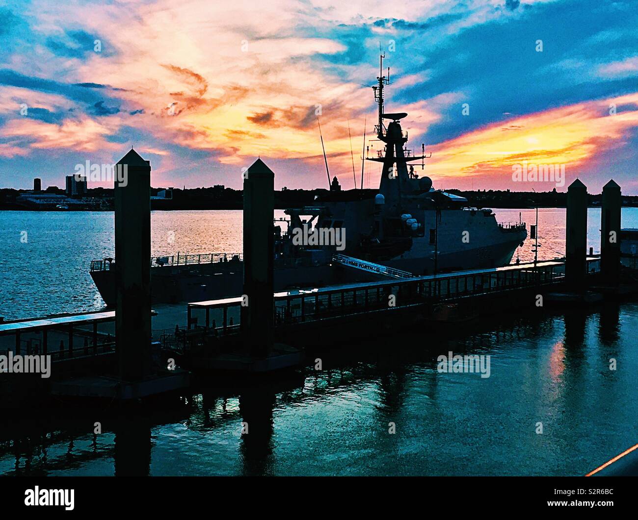 Liverpool docks at sunset Stock Photo - Alamy