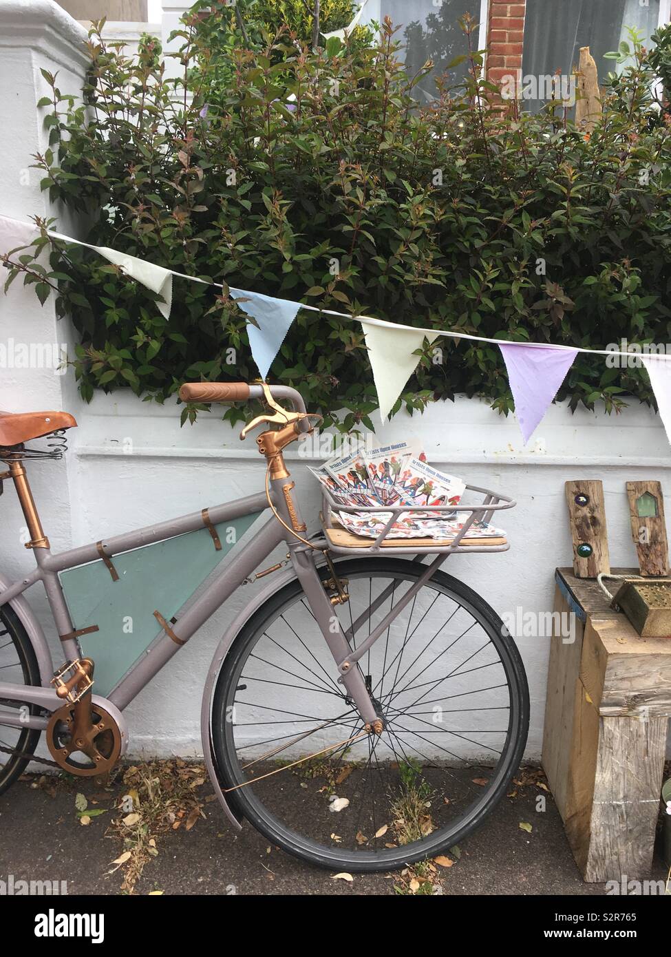Outside picture with bike and bunting Stock Photo - Alamy