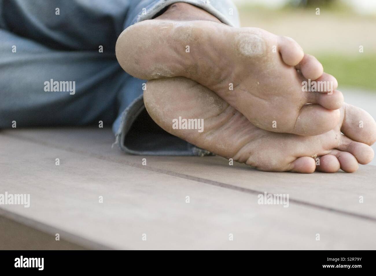 Feet of sleeping homeless hi-res stock photography and images - Alamy