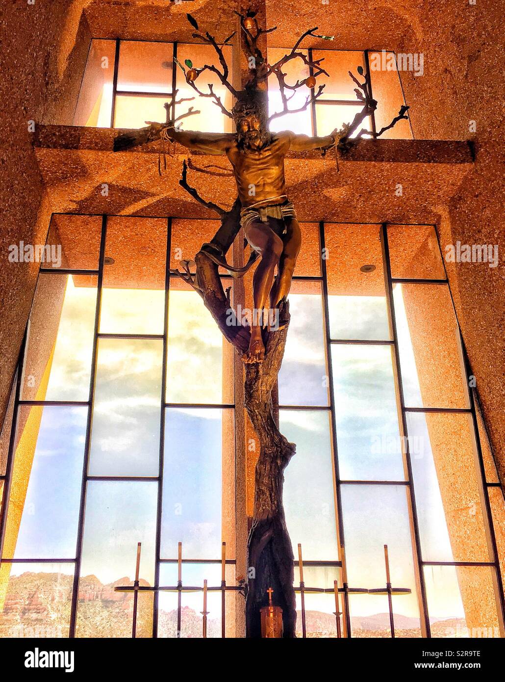 Bronze crucifix of Christ nailed to the Tree of Life in Chapel of the ...