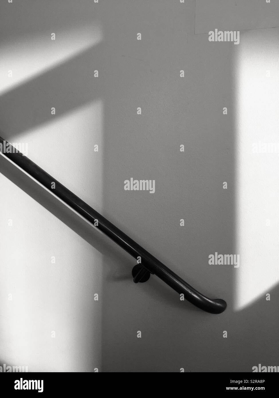 Handrail and shadows Stock Photo - Alamy