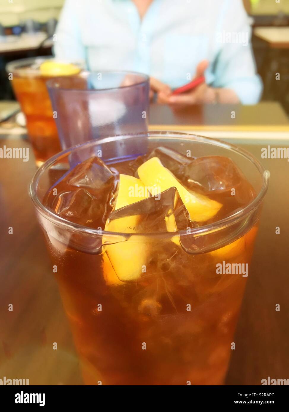 Iced tea glasses served at a casual restaurant, USA Stock Photo - Alamy