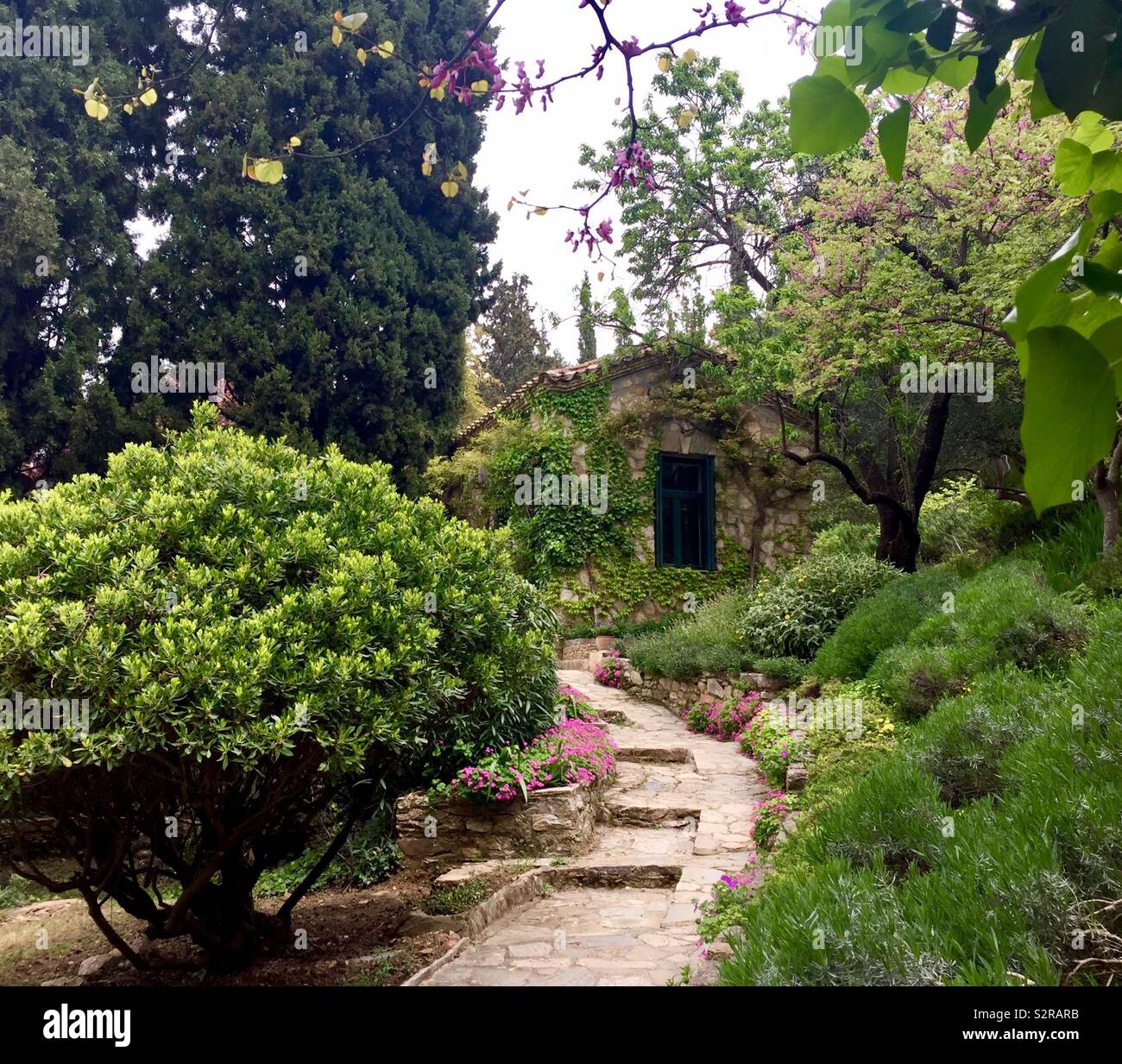 Greek monastery garden Stock Photo - Alamy