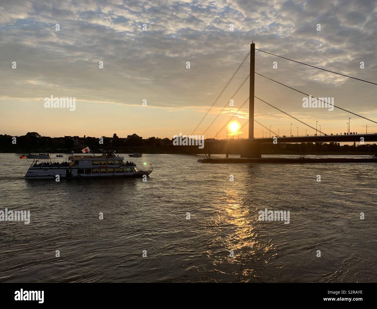 Bridge Sunset and a Ship Stock Photo - Alamy
