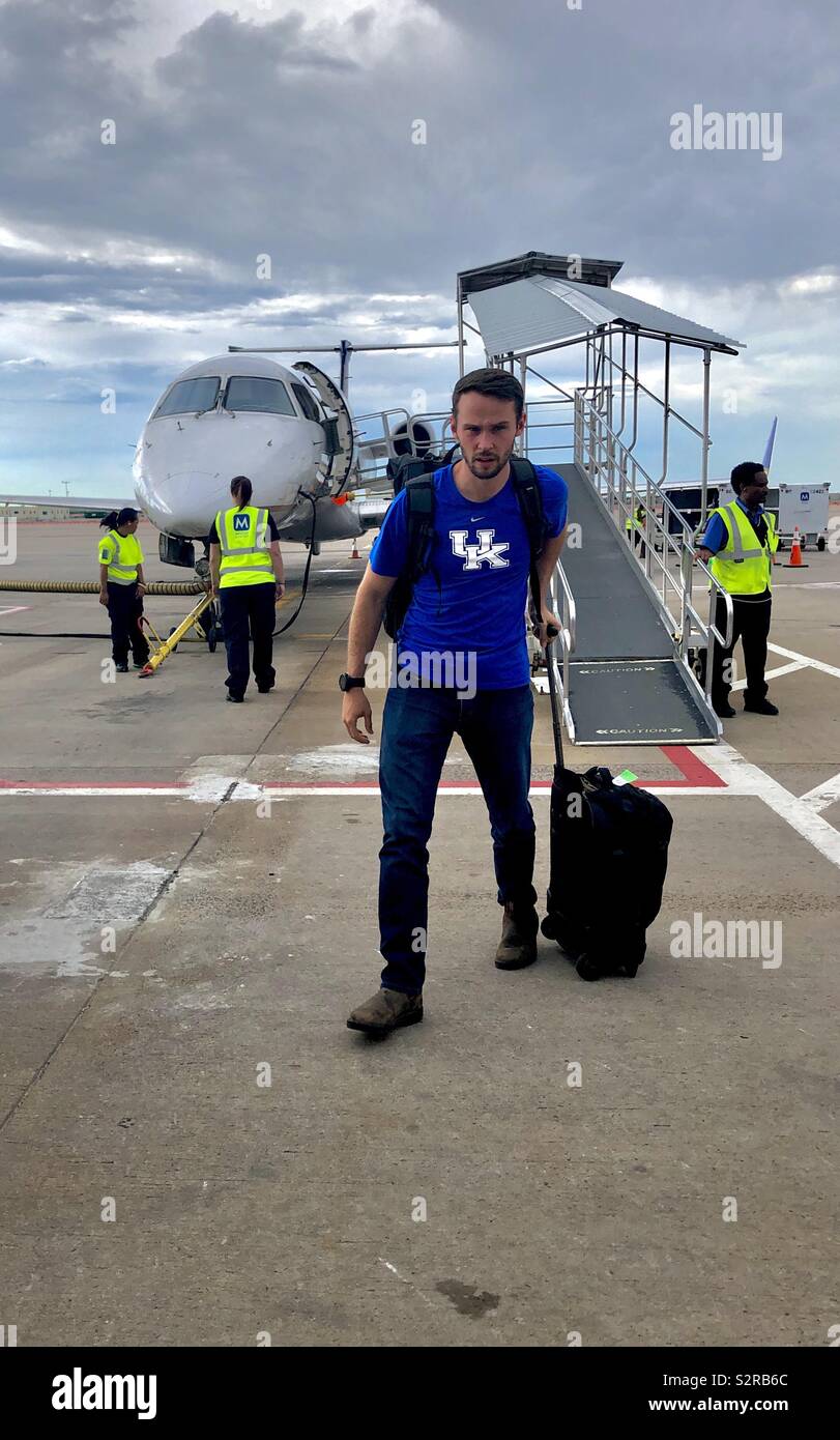 Man deplaning on the tarmac Denver airport Stock Photo - Alamy