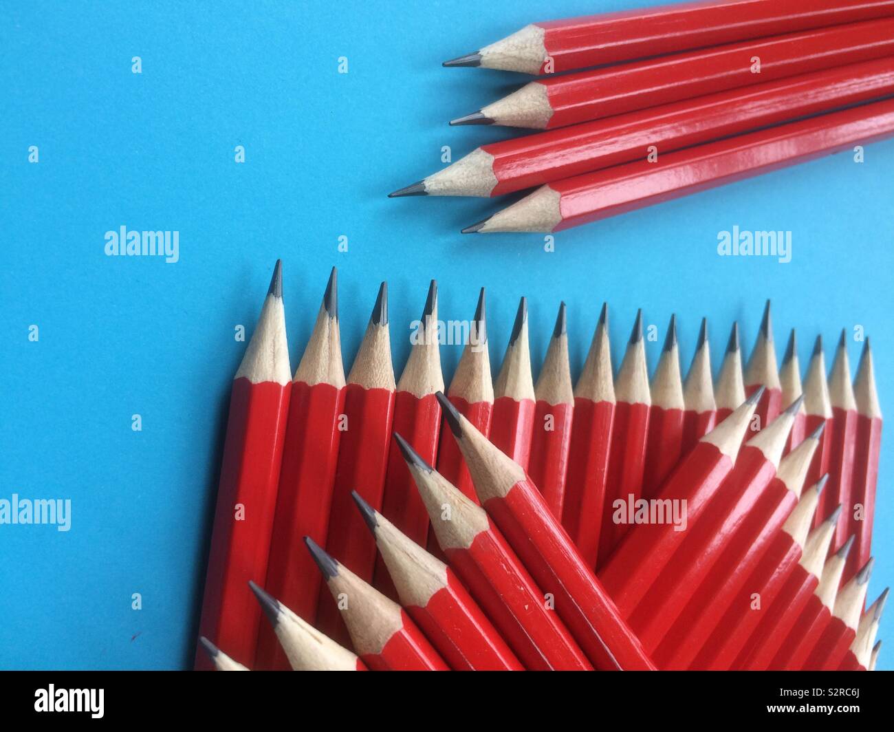 Close-up of set of graphite pencils isolated on blue background Stock ...