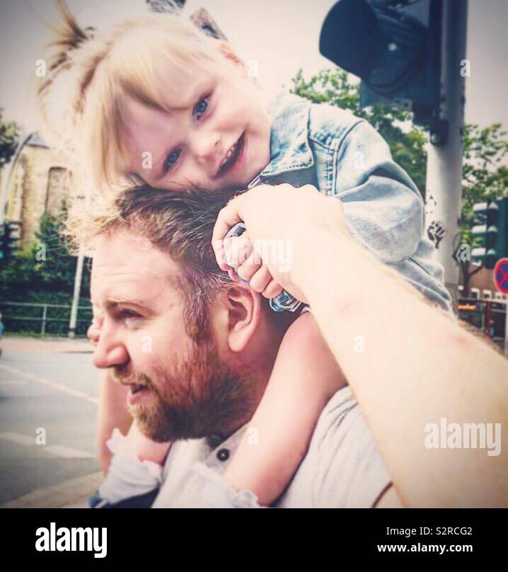 Shoulder ride hi-res stock photography and images - Alamy