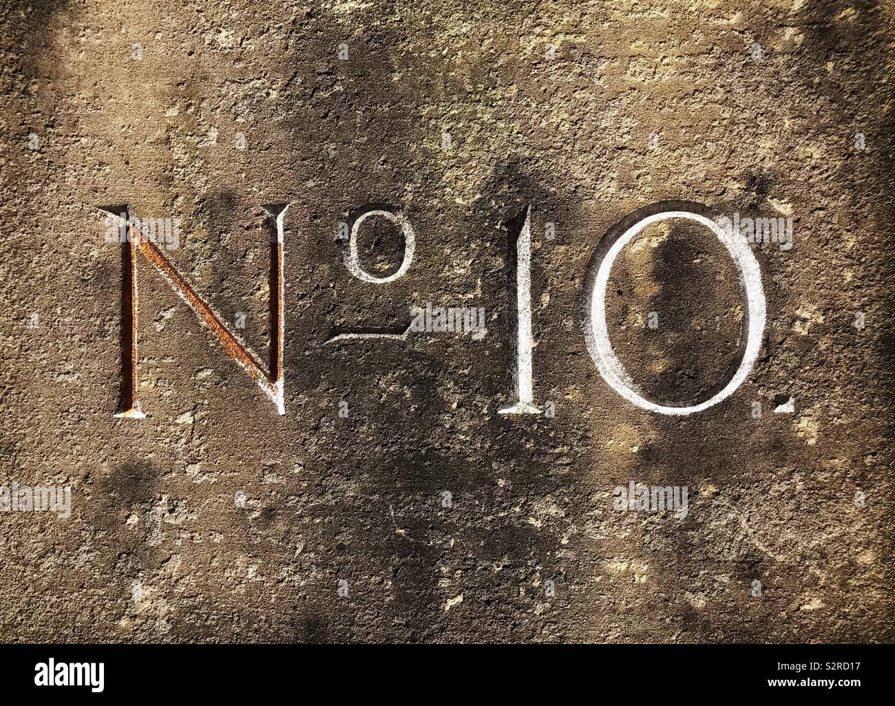 House number 10 carved in stone pillar Stock Photo - Alamy