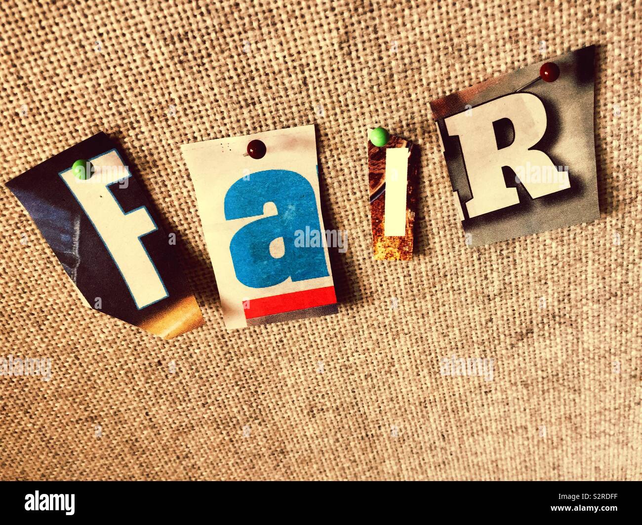 The word fair on a bulletin board using cut out paper letters in the ...