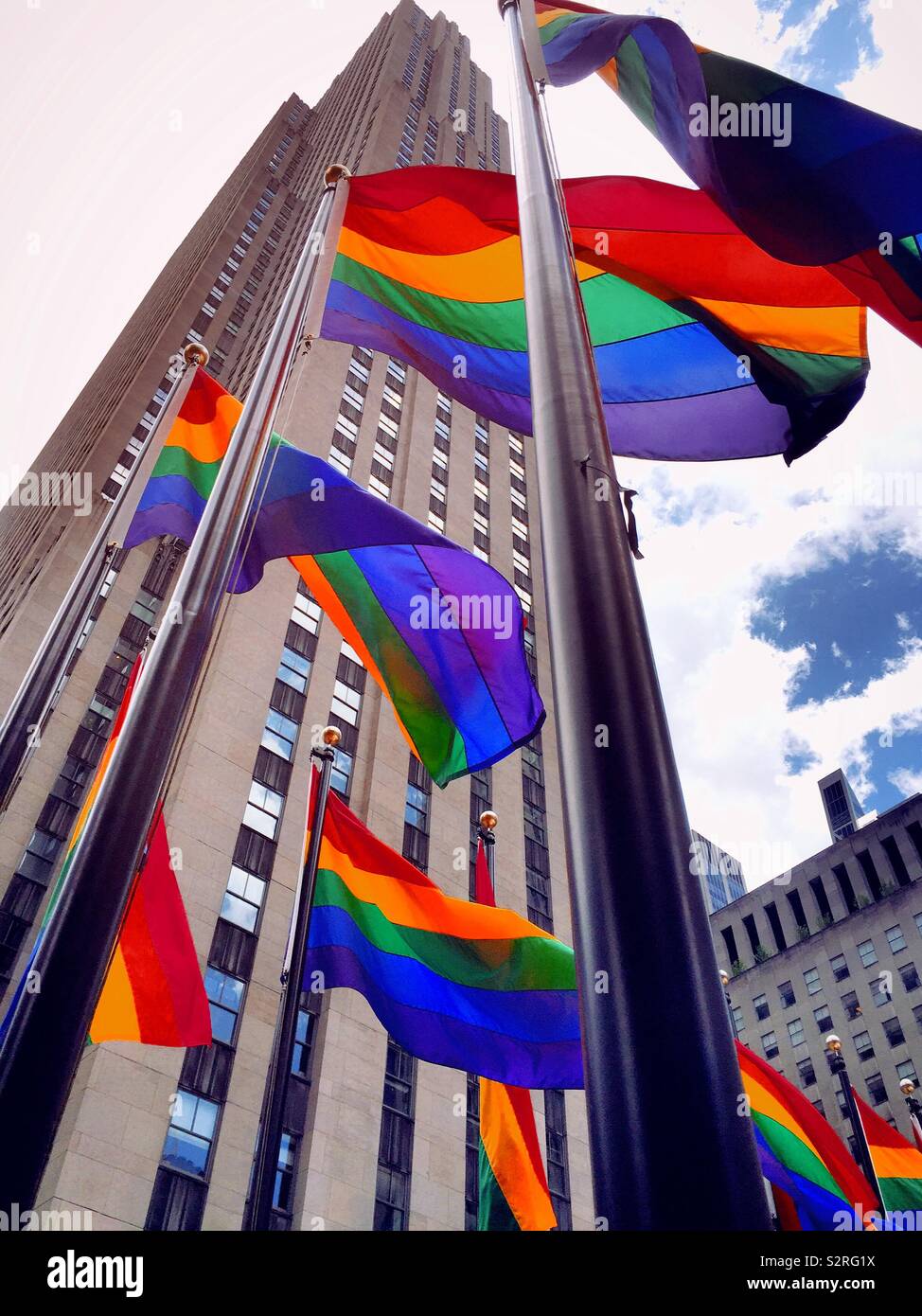 Rainbow flags proudly fly at the Rockefeller Center promenade to ...