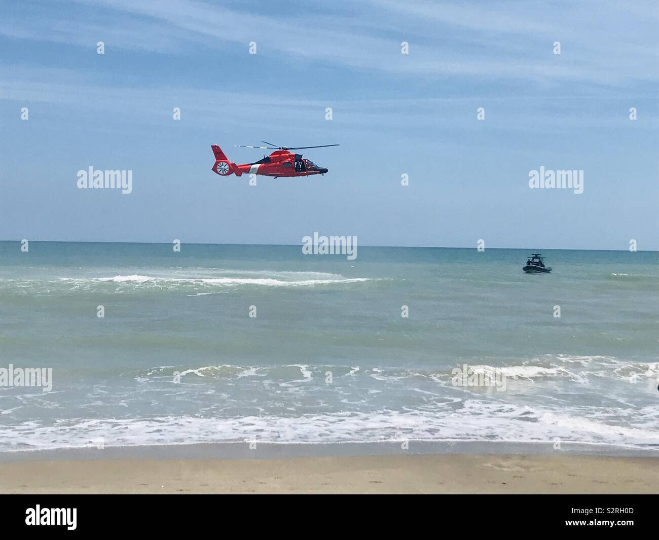 Helicopter and boat Stock Photo - Alamy
