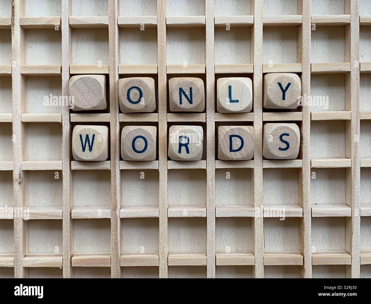 Only words text with a composition of wooden cube dice letters Stock ...