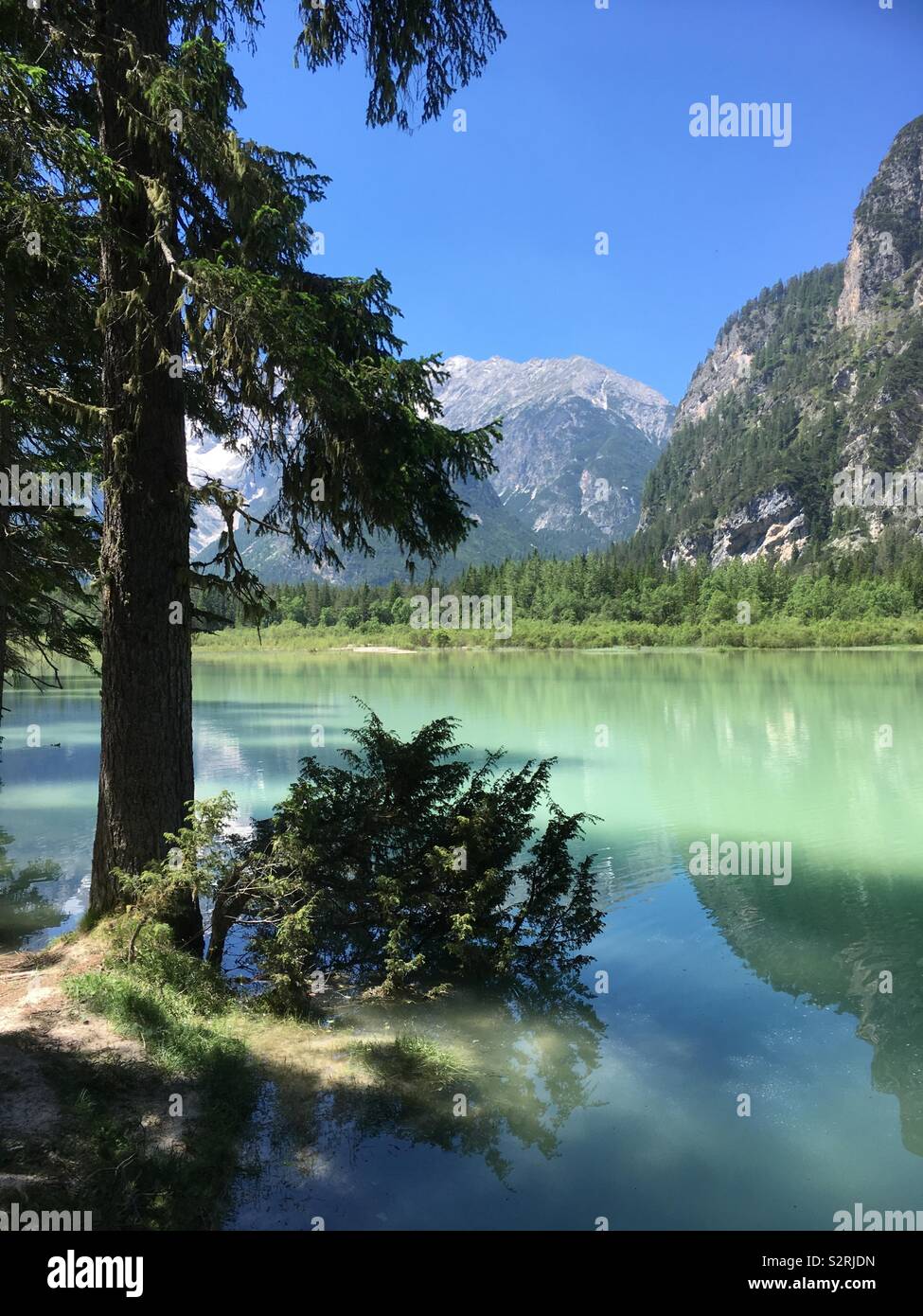Landscape view across a lake towards mountains in the distance Stock ...
