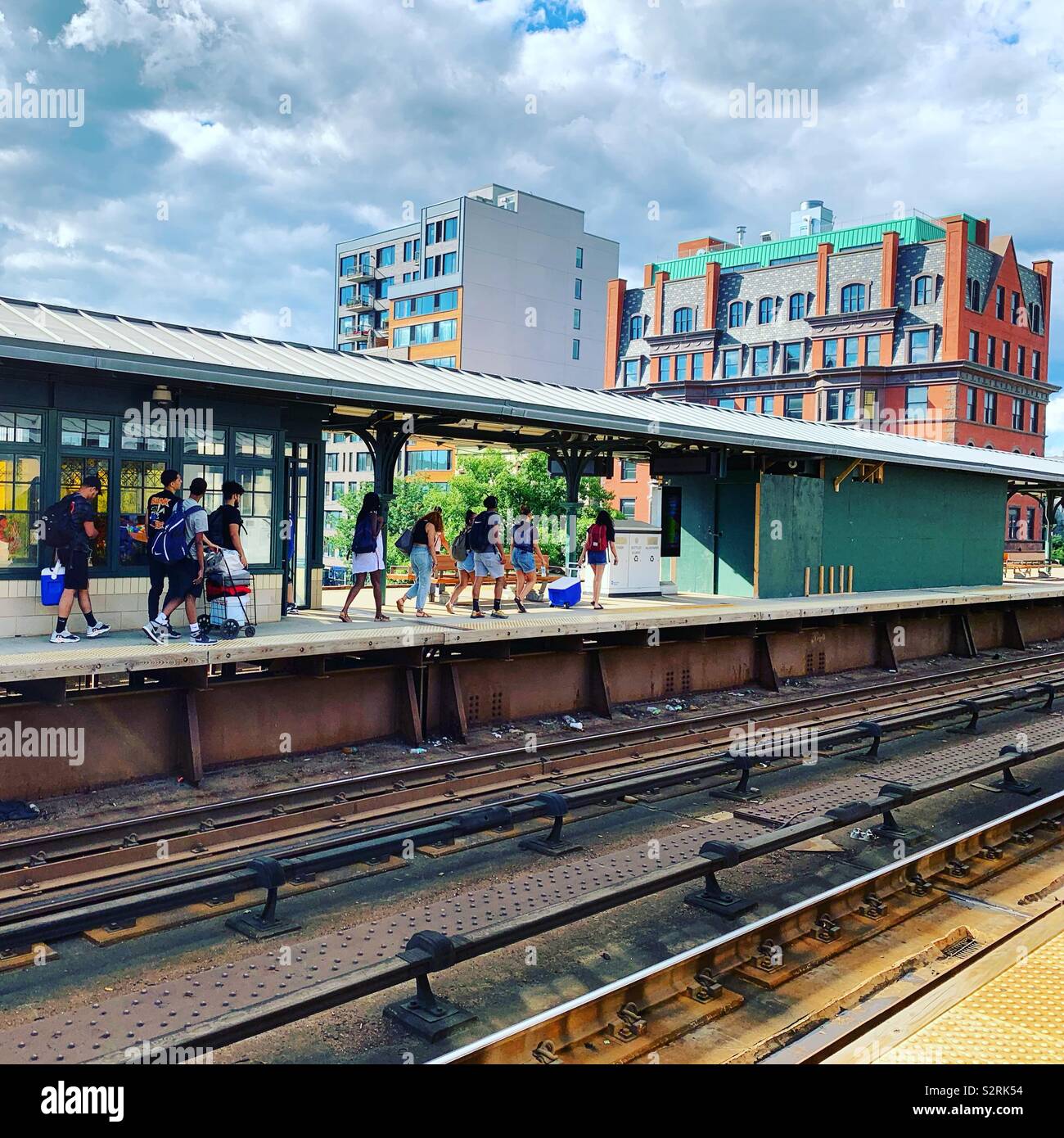 People waiting on the platform at the train station in South Norwalk ...