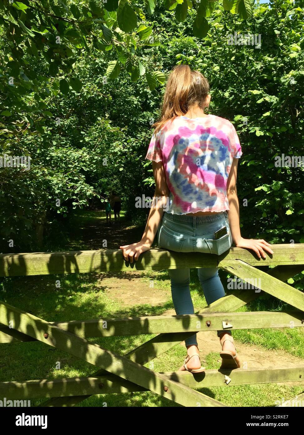 Sitting on the fence hi-res stock photography and images - Alamy