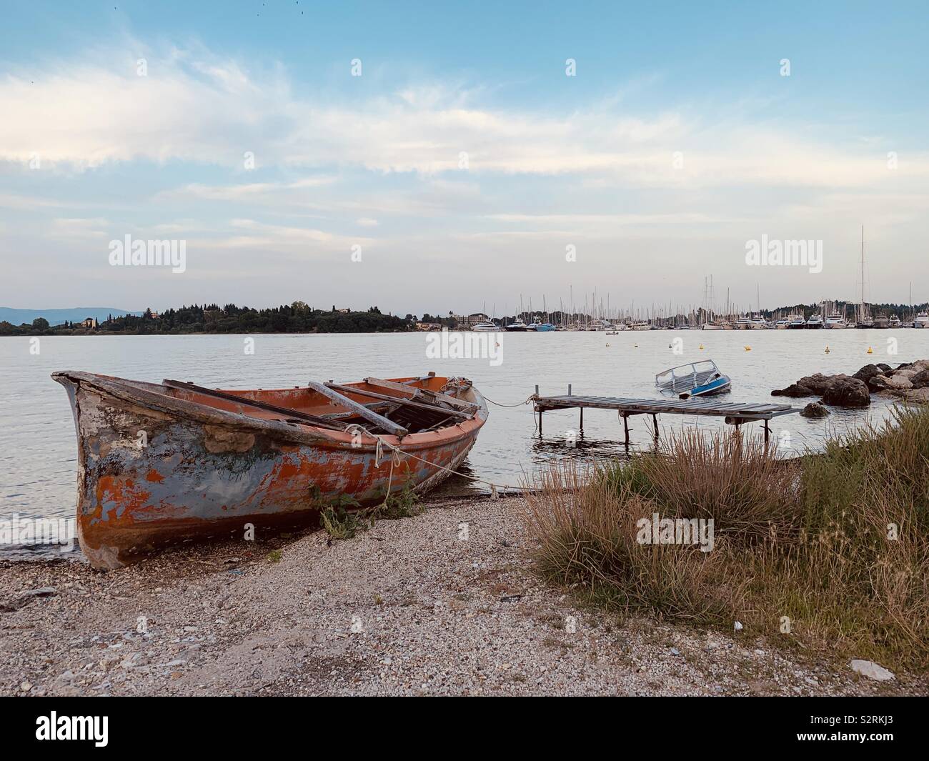 Boats on the sea shore Stock Photo - Alamy