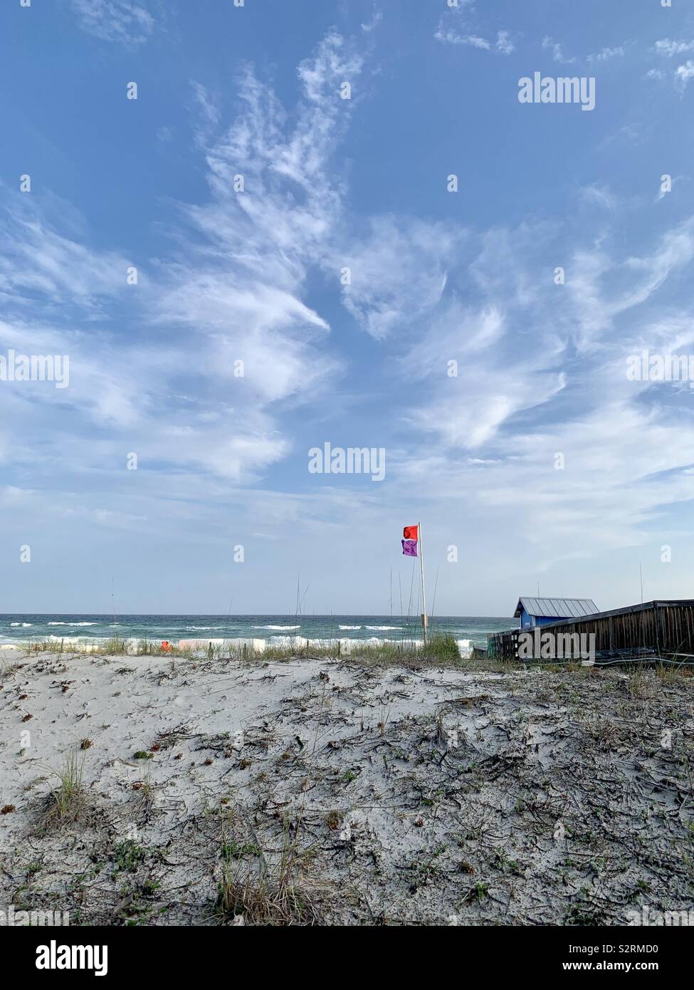 Seascape with beautiful white sand dunes and blue skies Stock Photo - Alamy