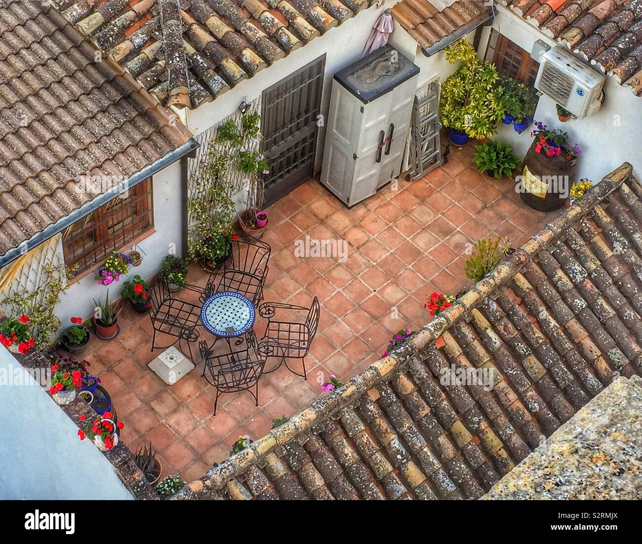 Cozy rooftop terrace in traditional Spanish house, Ronda, Spain Stock ...