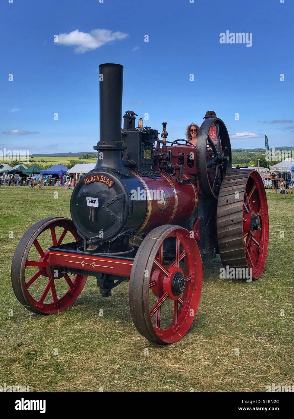 A woman driving a Steam Engine at a Duncombe Park Steam Rally Yorkshire ...