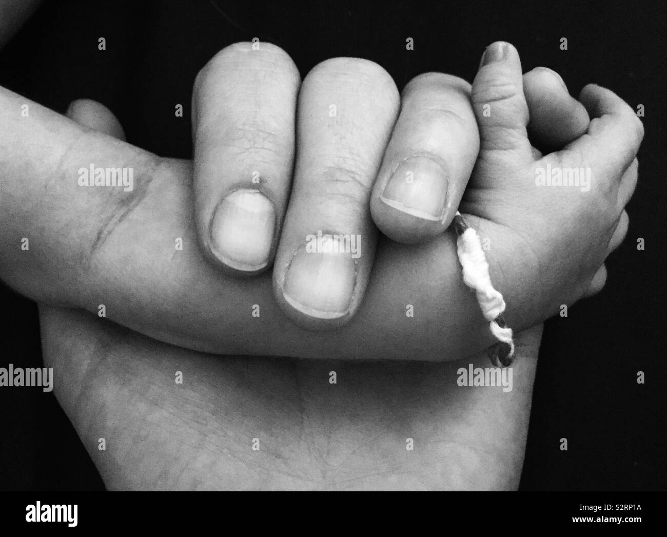 Baby hand hi-res stock photography and images - Alamy