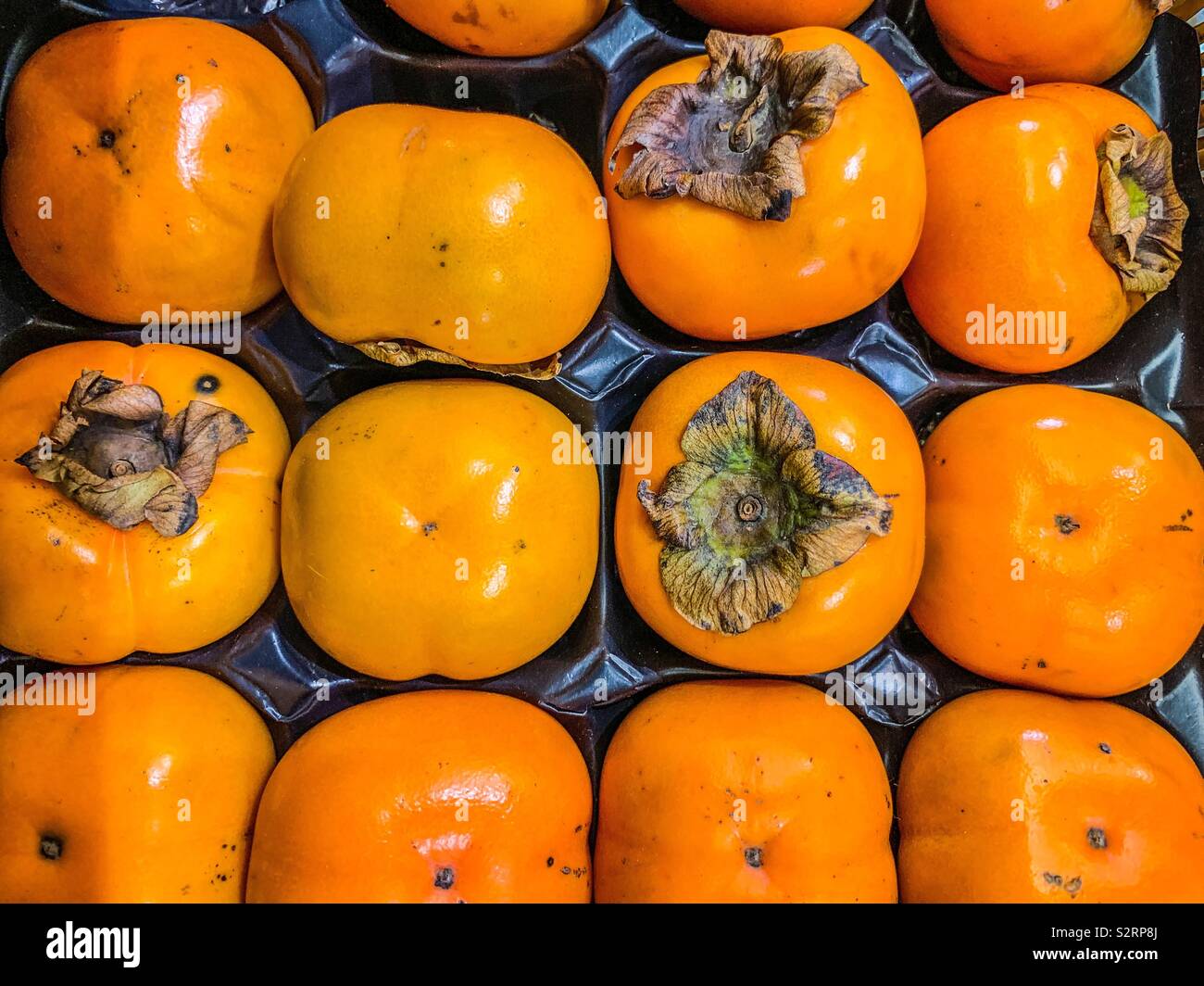 Sharon fruit hi-res stock photography and images - Alamy