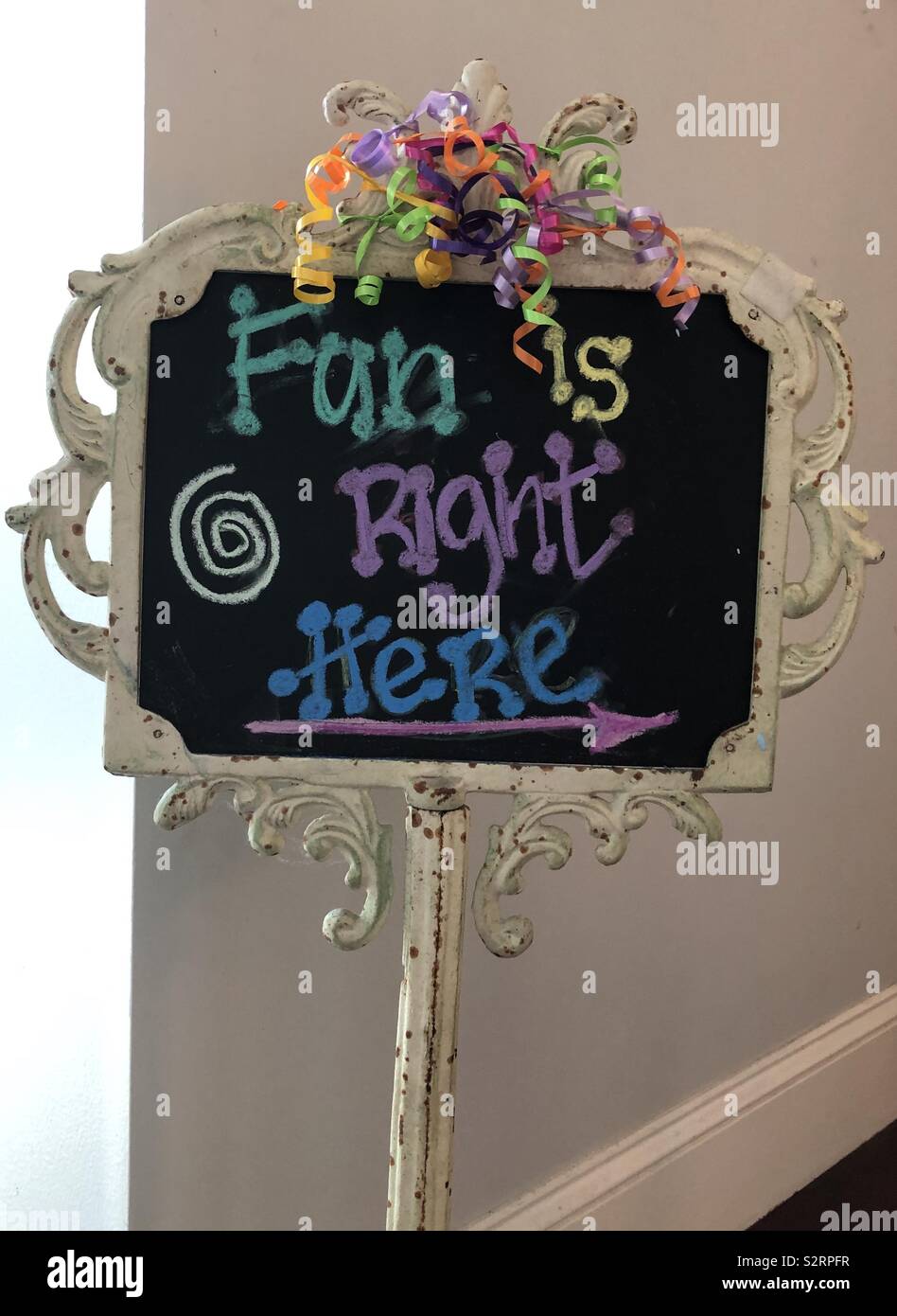 Fun is right here sign, hand painted Stock Photo - Alamy