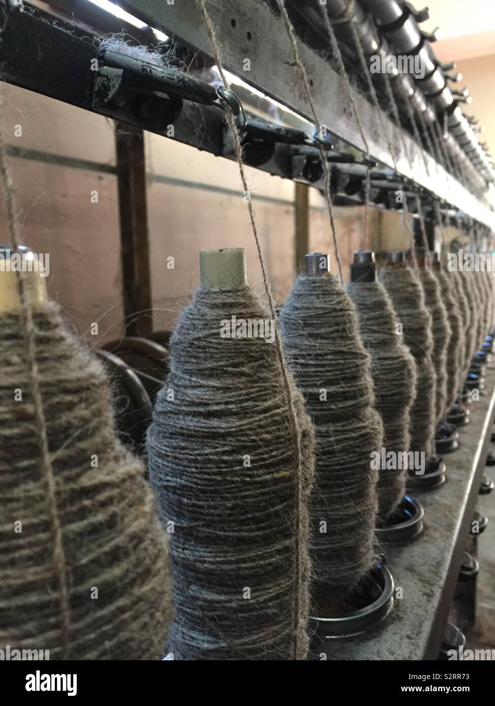 Wool yarn at traditional Romanian mill Stock Photo - Alamy