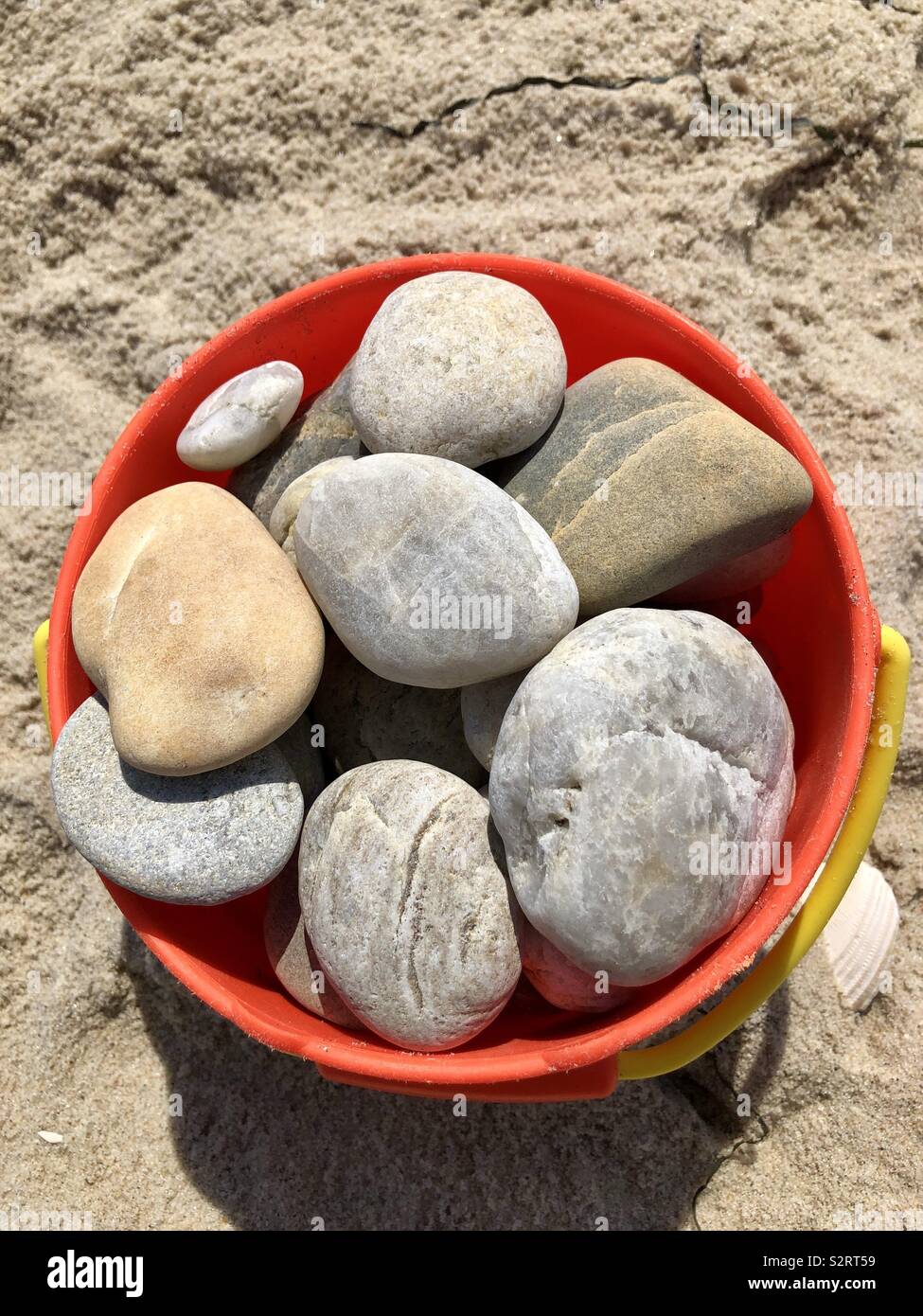 Bucket on the beach hi-res stock photography and images - Alamy
