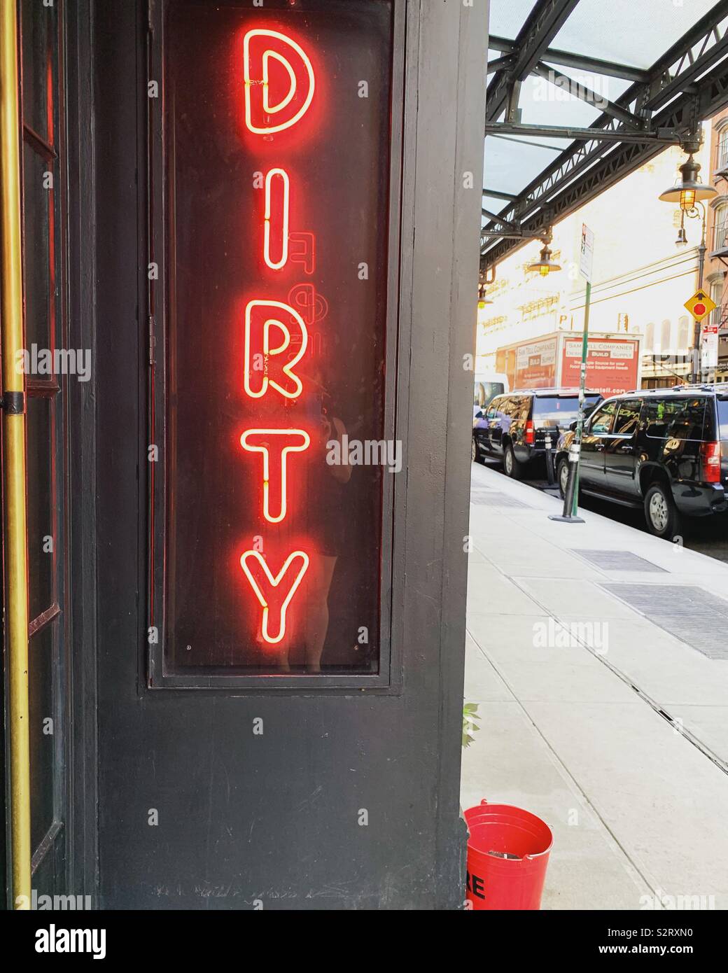 Red neon sign that says “DIRTY,” Lower East Side, New York City Stock ...