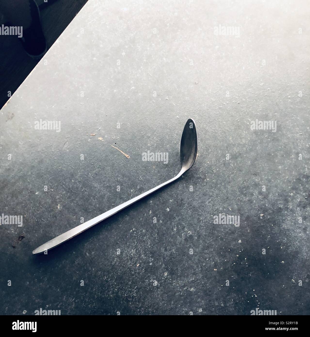 Bent spoon hi-res stock photography and images - Alamy