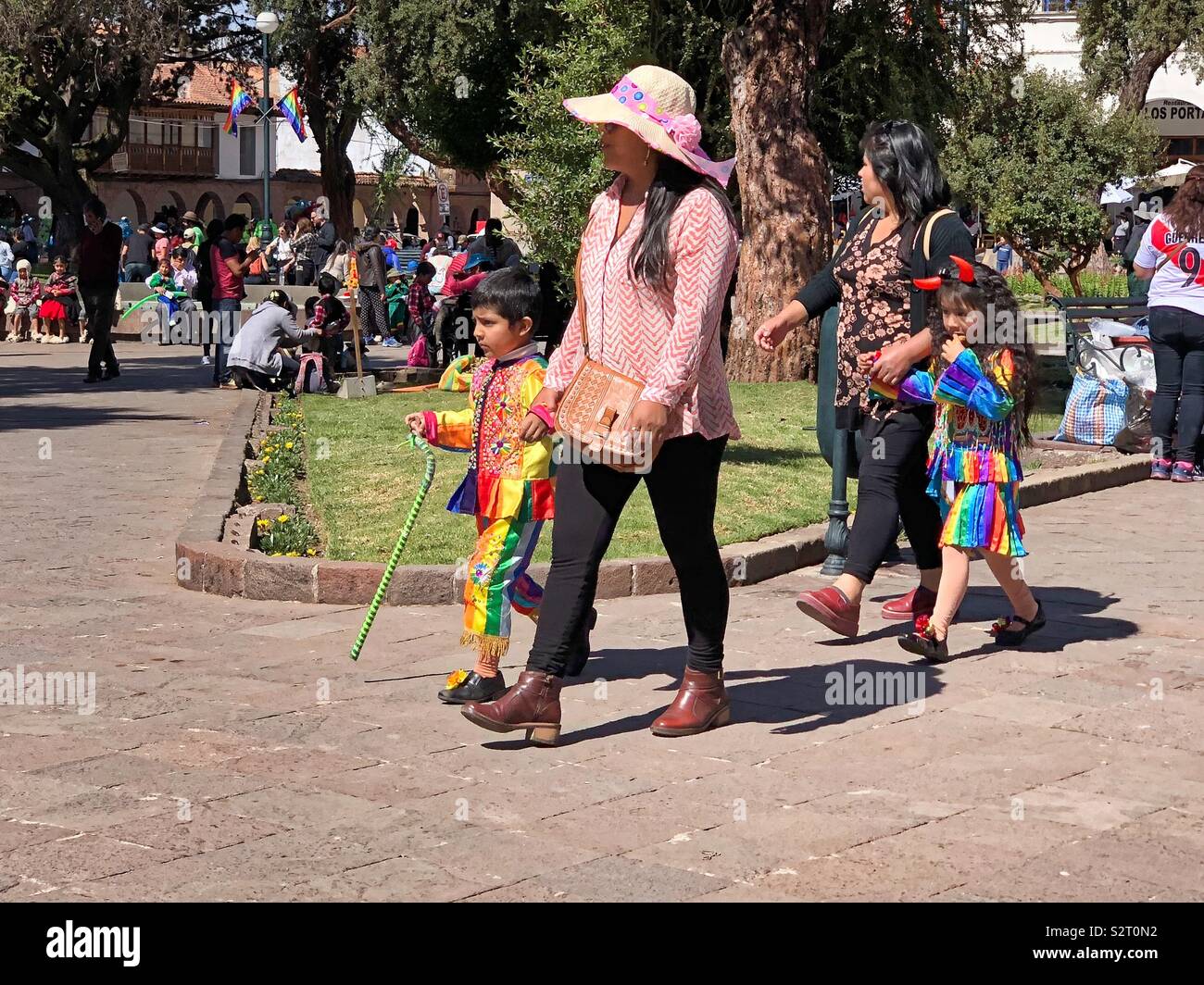 Mothers with children in colourful costumes during Inti Raymi or Inti ...
