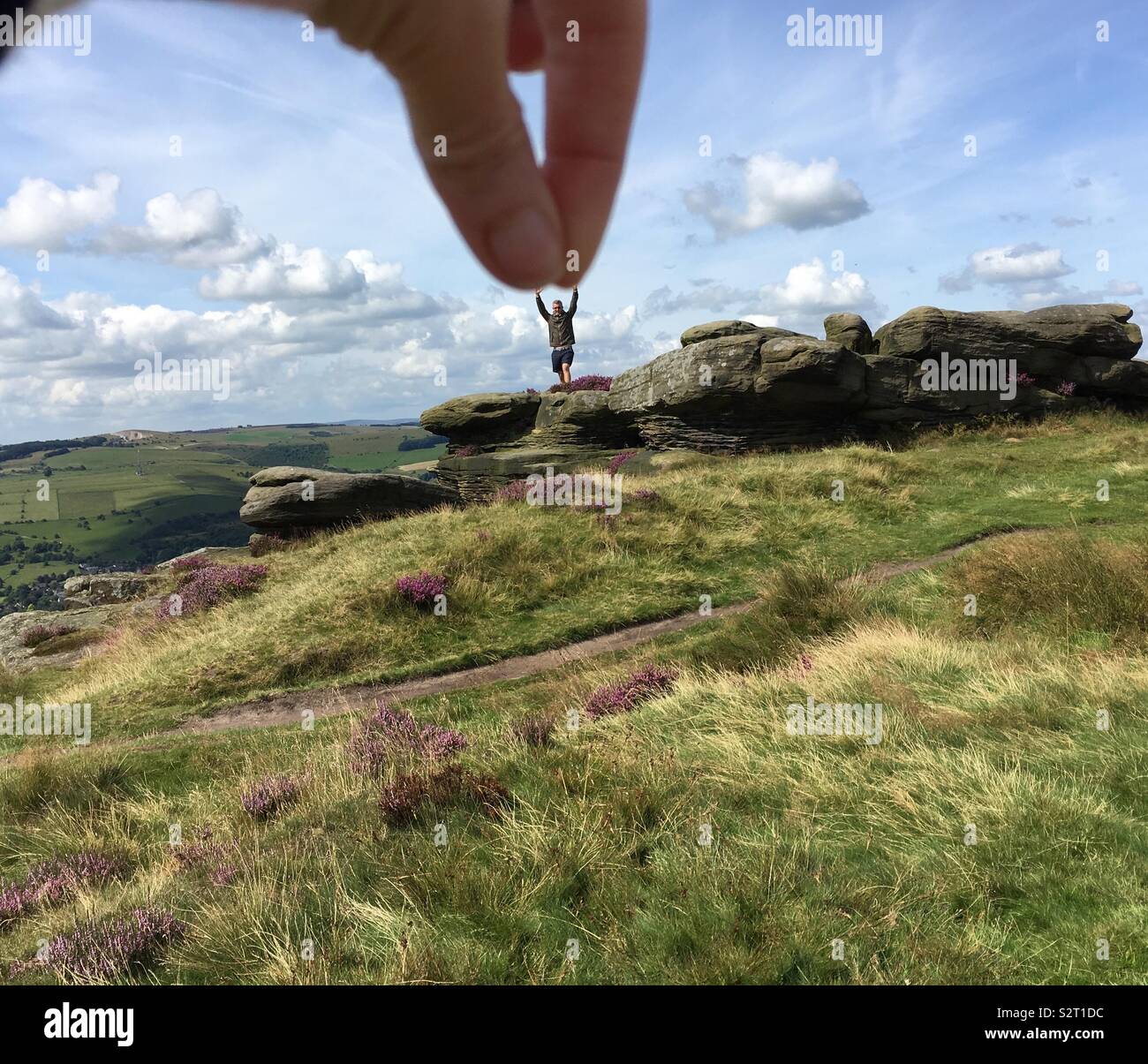 Hanging by hands hi-res stock photography and images - Alamy