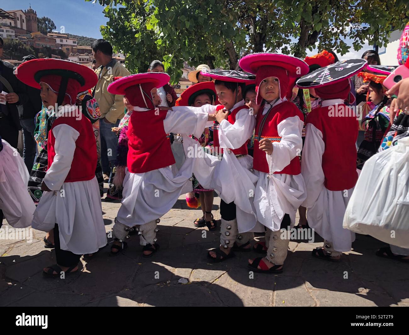 Several young Peruvian boys dressed up to dance in the Inti Raymi or ...