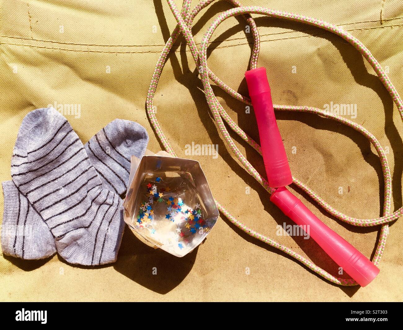 Child’s play jump rope kaleidoscope socks Stock Photo - Alamy