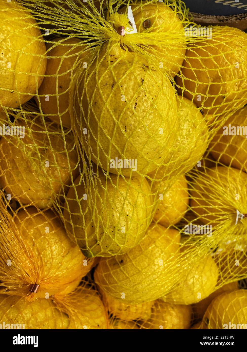 Bag of ripe lemons Stock Photo - Alamy