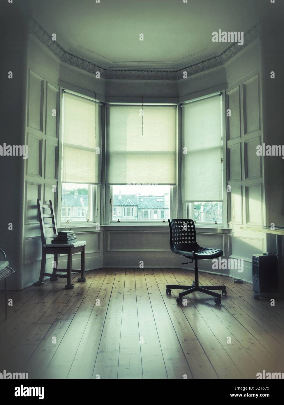 Natural light in a bay windowed room Stock Photo - Alamy