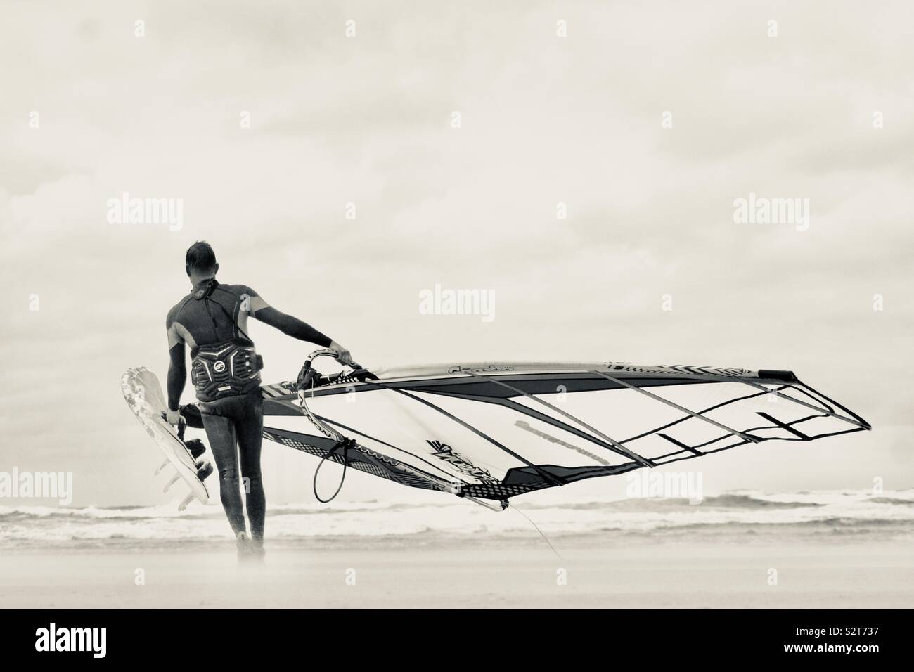 Surfboard and sail on the beach hi-res stock photography and images - Alamy