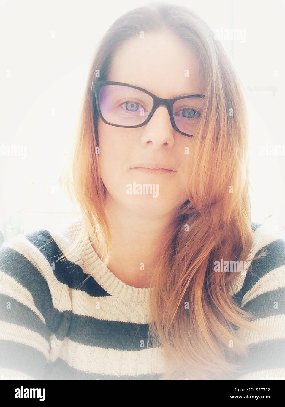 Picture of women looking thoughtful Stock Photo - Alamy