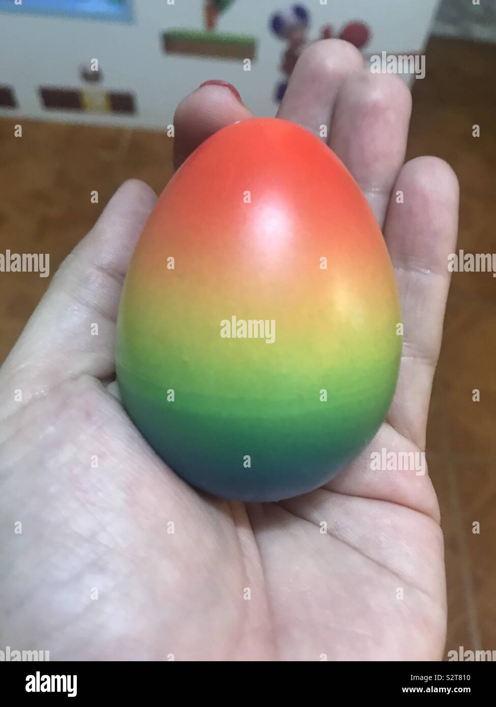 Surprise egg. Rainbow egg Stock Photo - Alamy