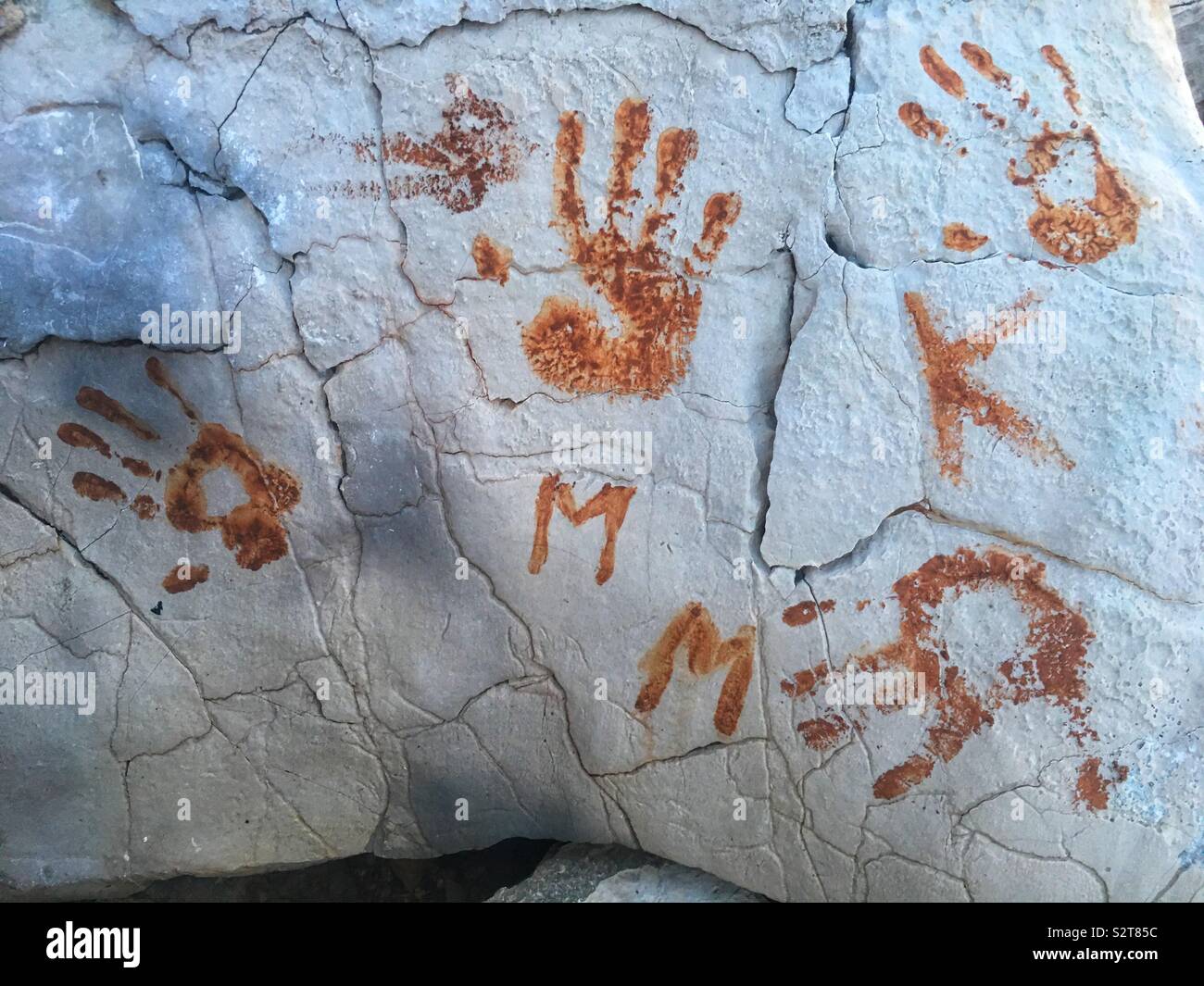 Hand print mud Stock Photo - Alamy