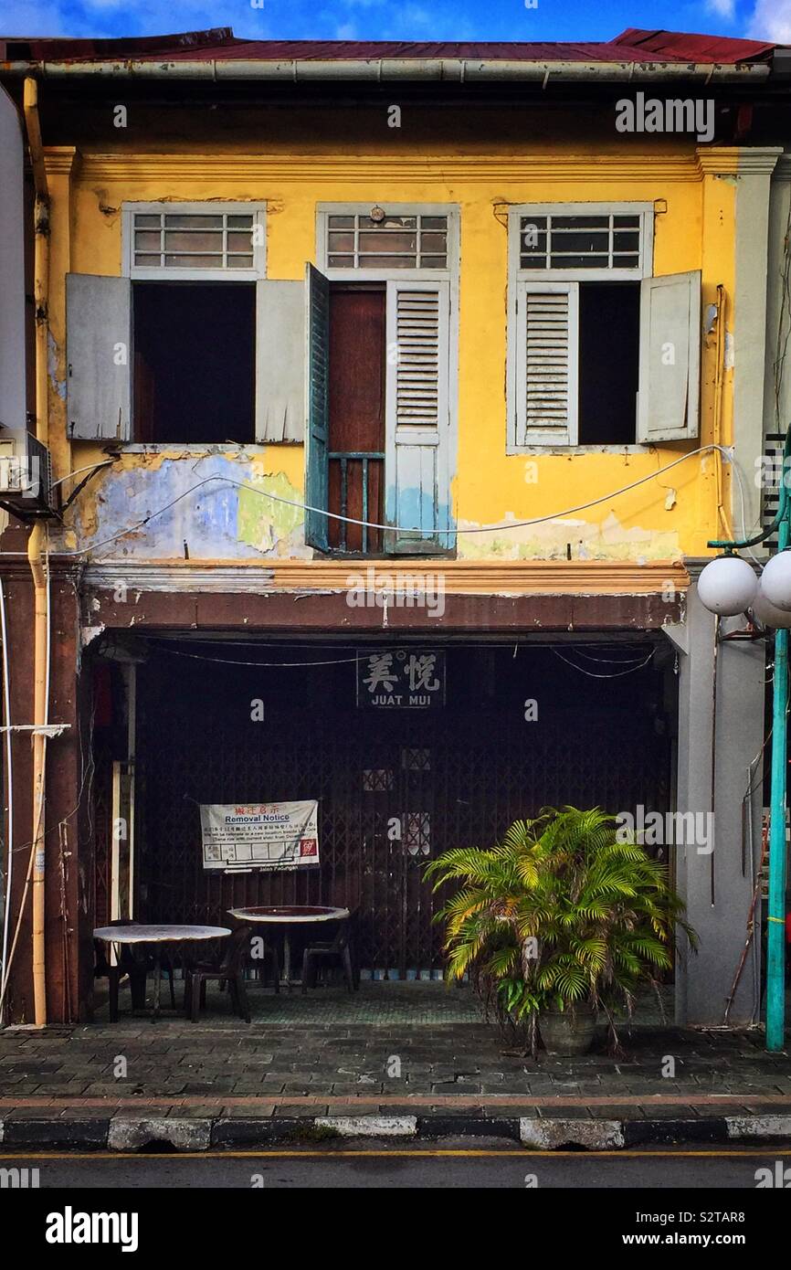 The colourful façade of a terraced shophouse in the old Main Bazaar at ...