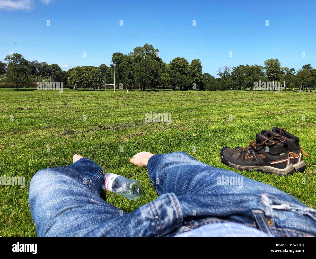 Sunbathing in the park Stock Photo - Alamy