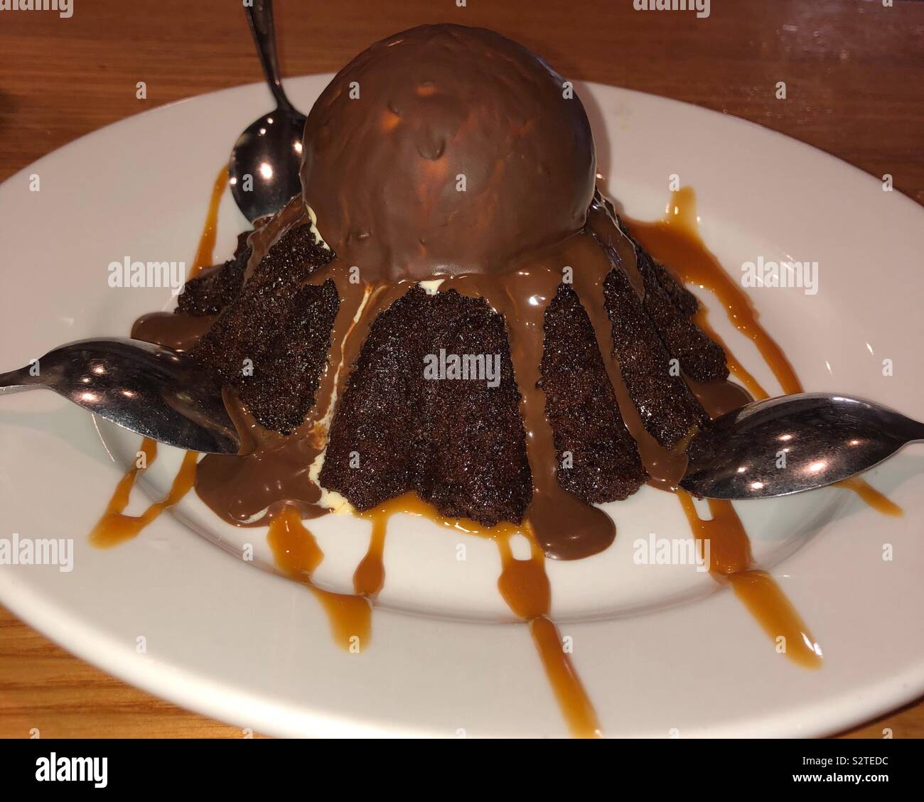 Triple chocolate volcano melt down Stock Photo - Alamy