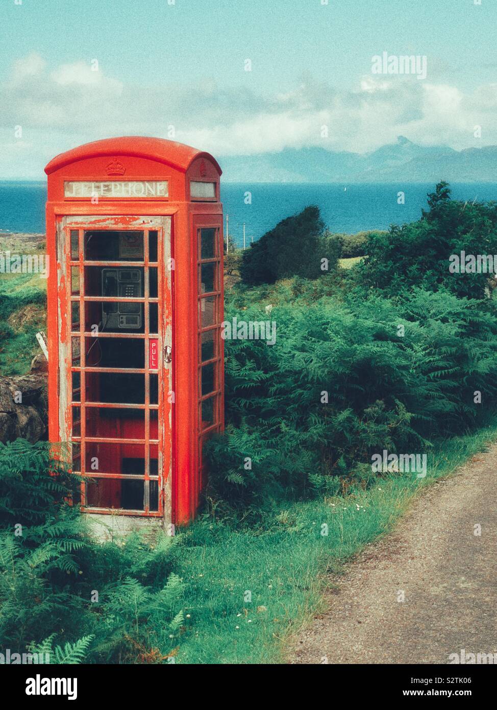 Original red telephone box on the stunning wild coast of the ...