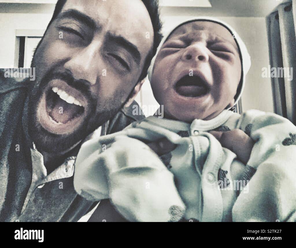 Father and newborn son crying Stock Photo - Alamy